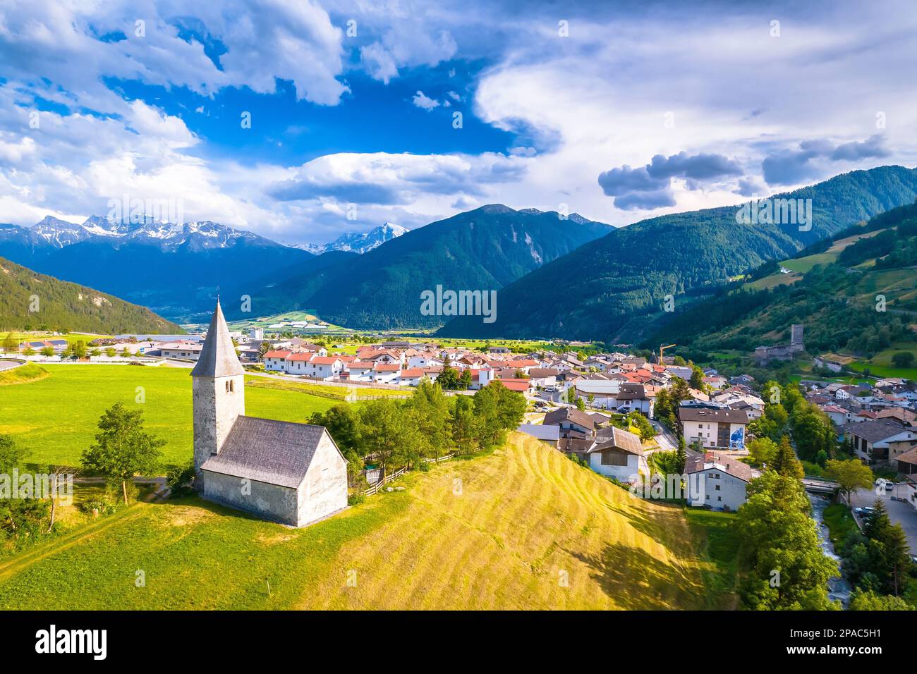 Idyllic alpine village of Burgeis and Abbey of Monte Maria view ...