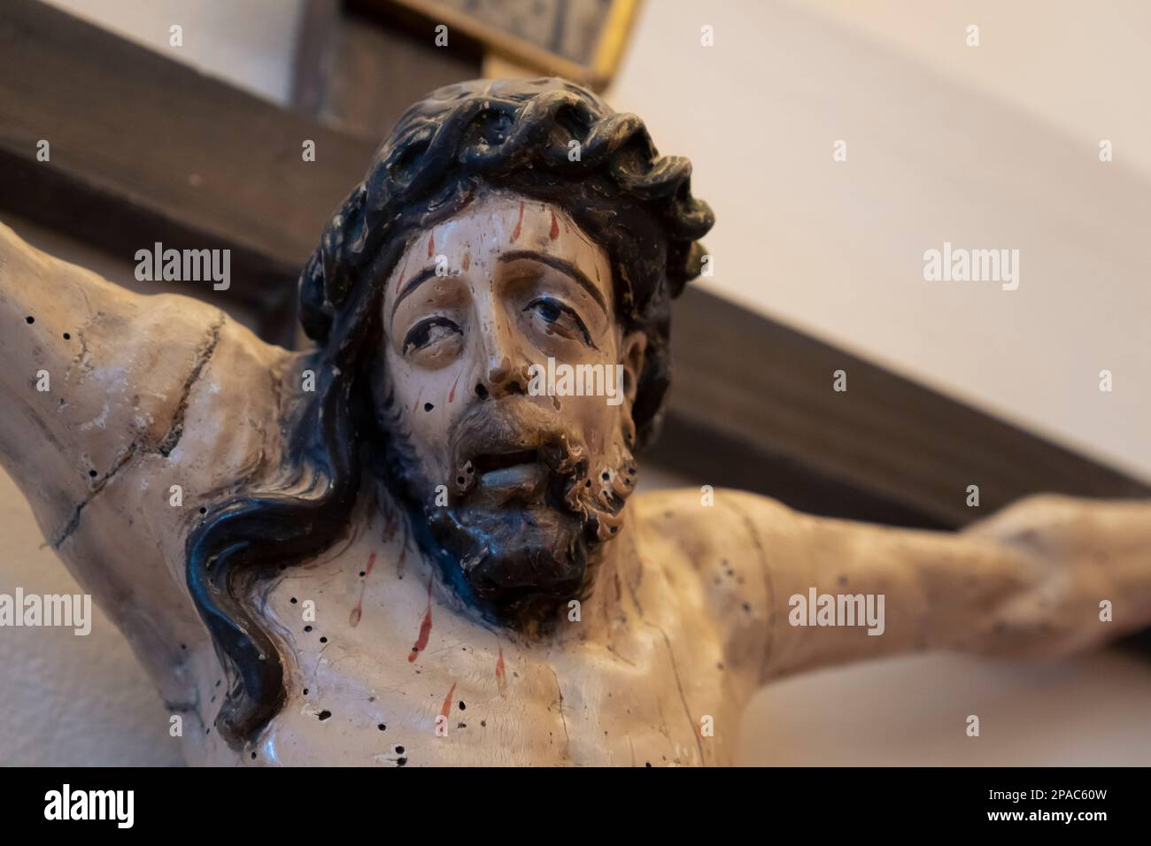 Detail of a polychrome figure depicting the Crucifixion of Jesus Christ ...