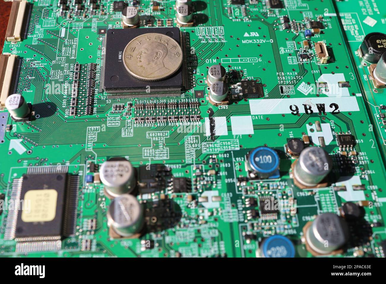 Taiwanese currency and semiconductor printed circuit boards Stock Photo ...