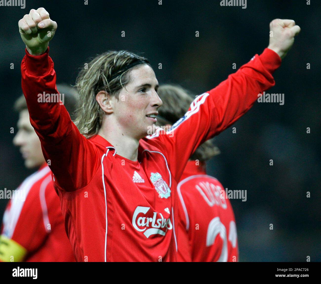 Liverpool forward Fernando Torres celebrates after scoring, during a ...