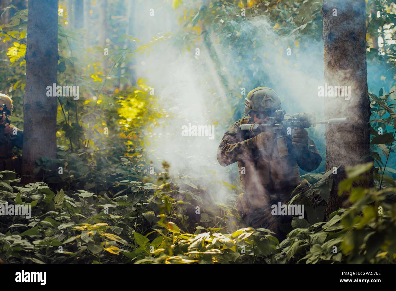 A modern warfare soldier on war duty in dense and dangerous forest ...