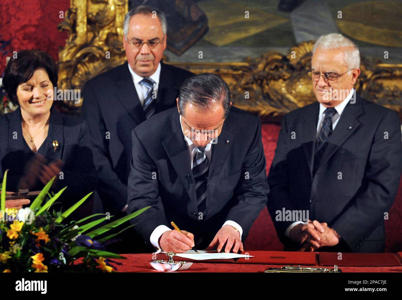 Malta Prime Minister Lawrence Gonzi, at center, with his wife Kate ...
