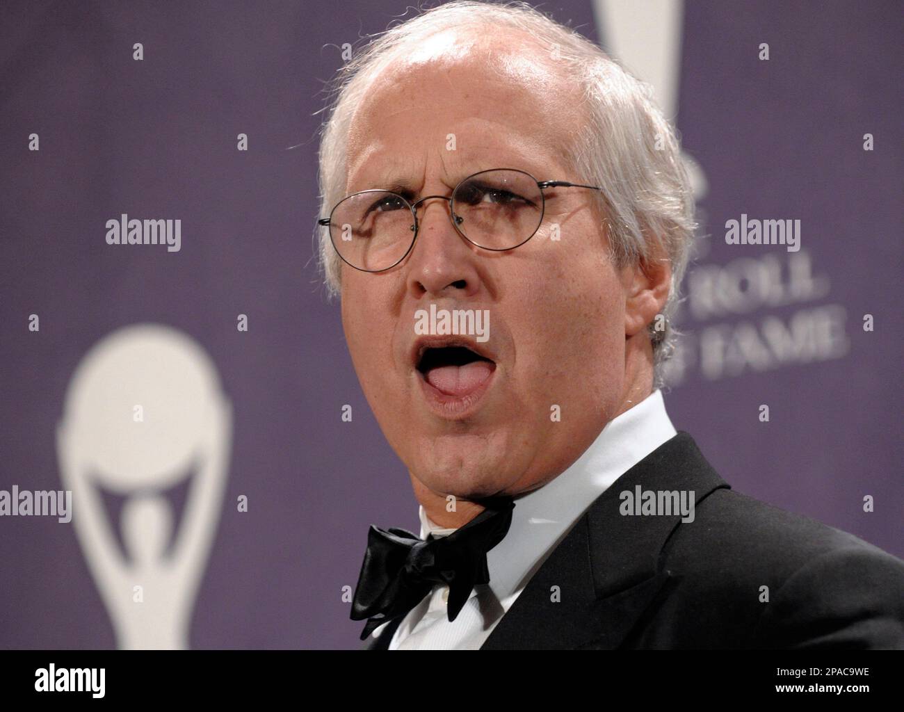 Actor Chevy Chase poses backstage at the Rock and Roll Hall of Fame ...