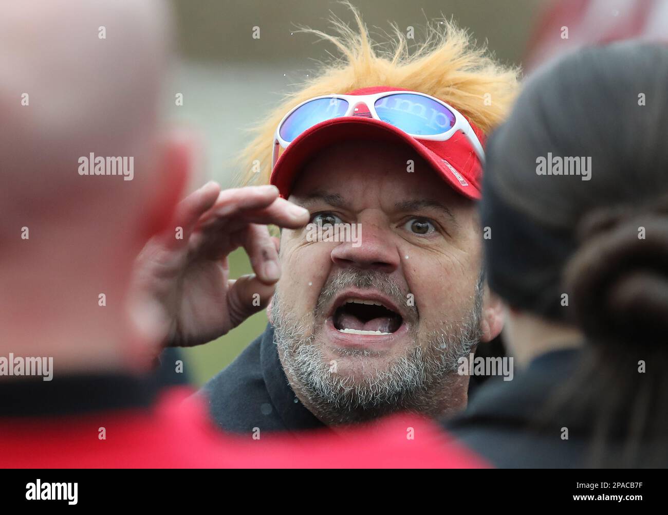 Wadsworth, United States. 11th Mar, 2023. A man clashes with members of ...
