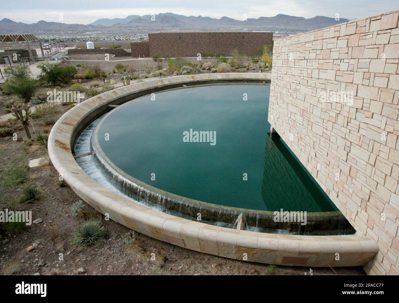 A flow splitter, a circular structure that adds oxygen to water, is ...