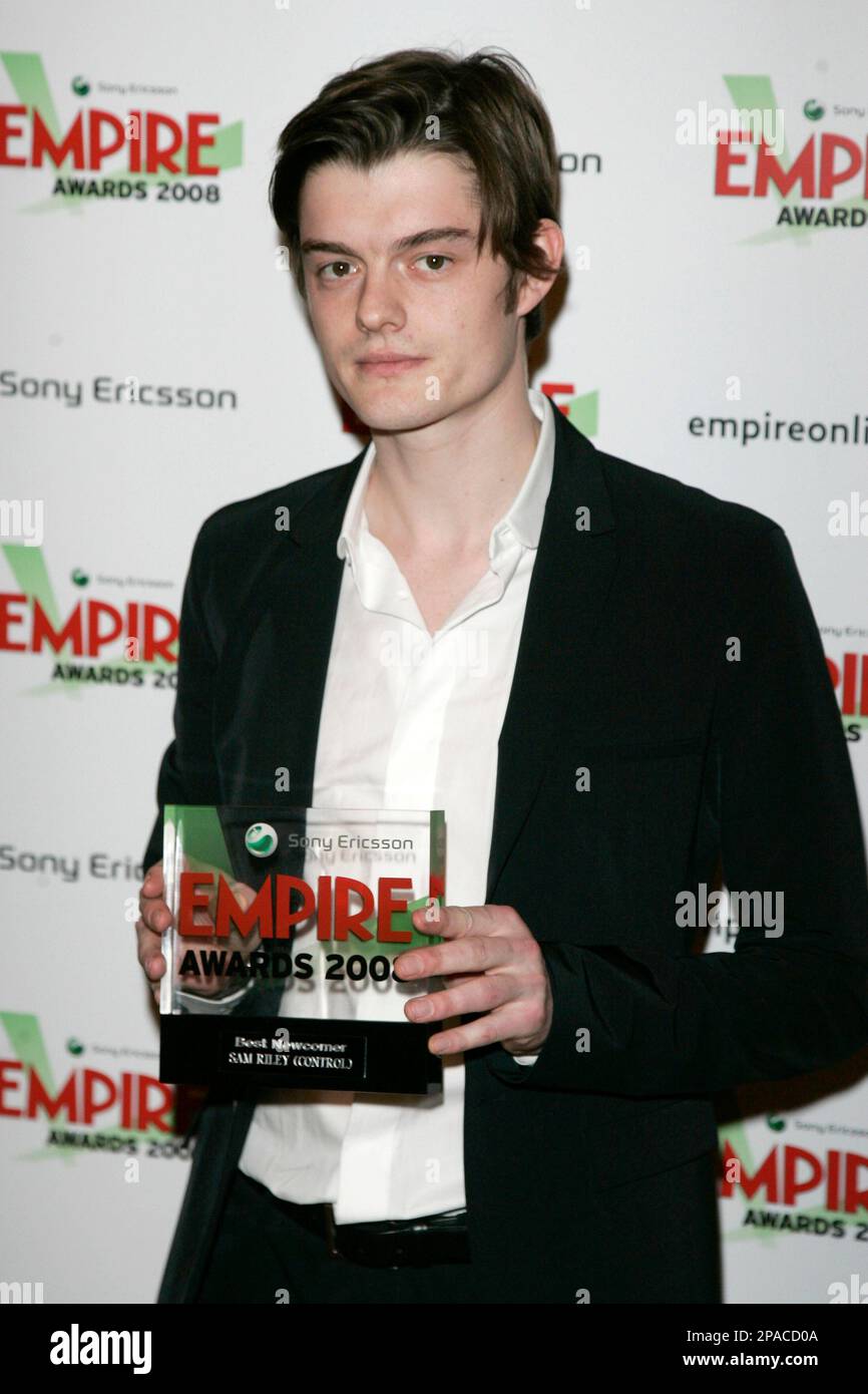 British actor Sam Riley poses with his Empire Film Award for best ...