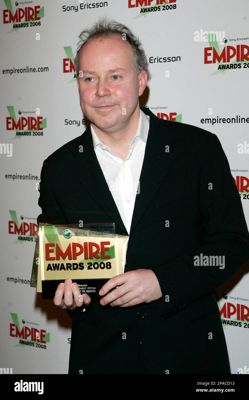 British Director David Yates poses with his Empire Film Award for best ...