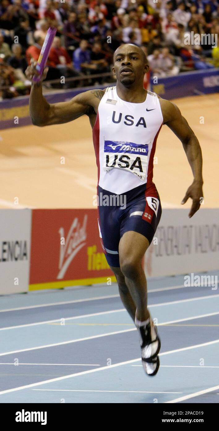 United States' Kelly Willie crosses the finish line to win the gold ...