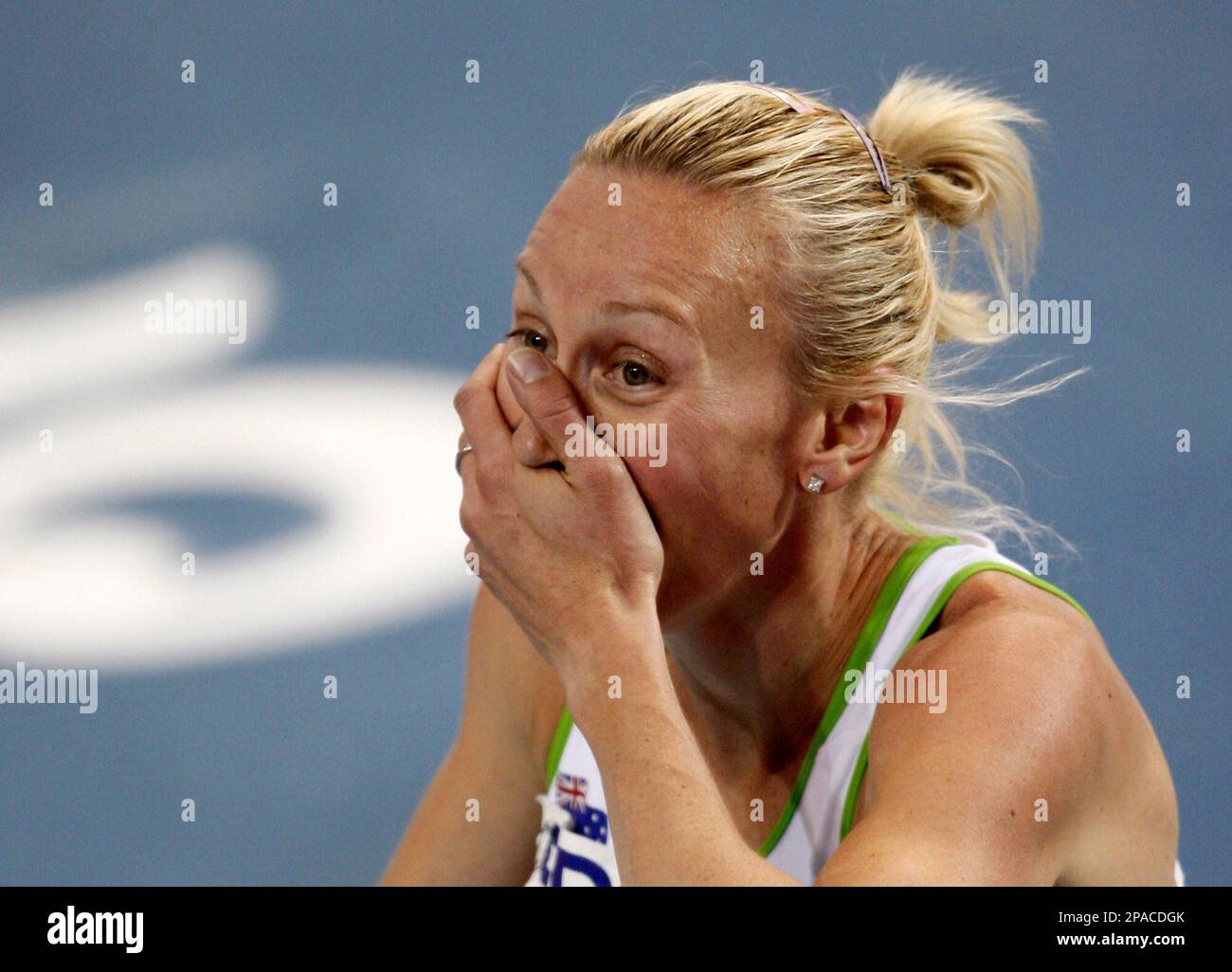 Australia's Tamsyn Lewis reacts after winning the gold medal in the ...