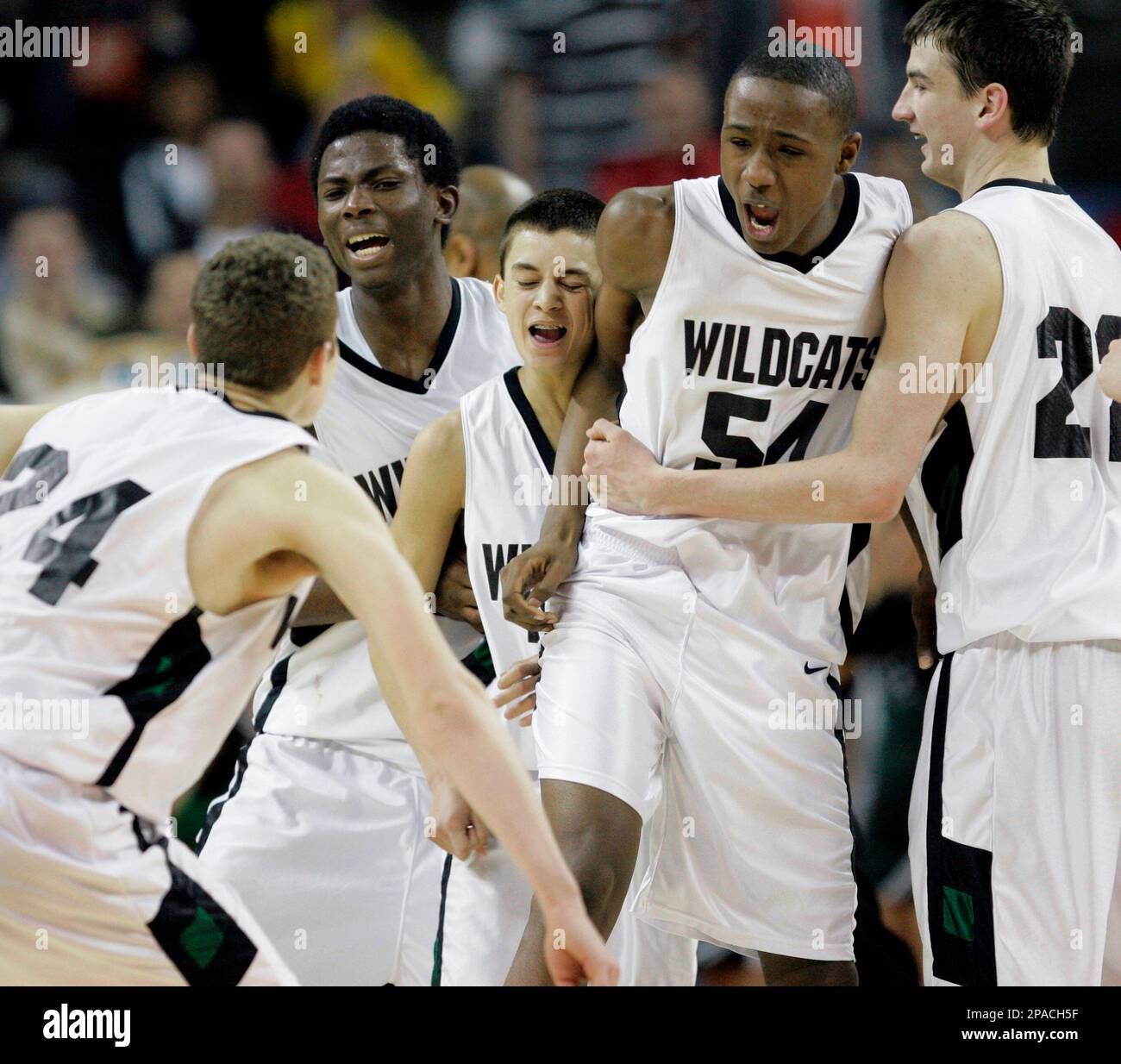Kennedale forward Brian Davis, left, celebrates after his two-pointer ...