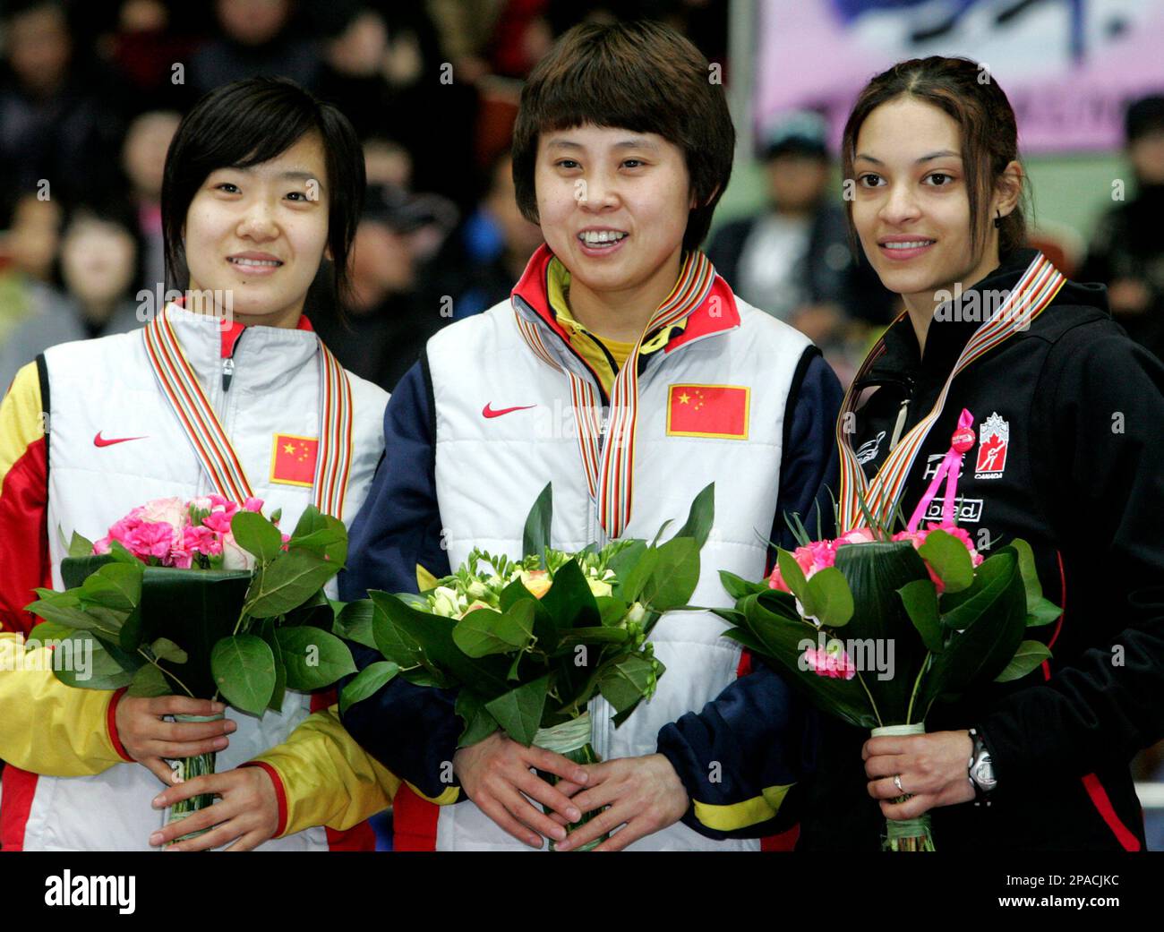 China's Wang Meng, center, her teammate Liu Qiuhong and Canada's Kalyna ...