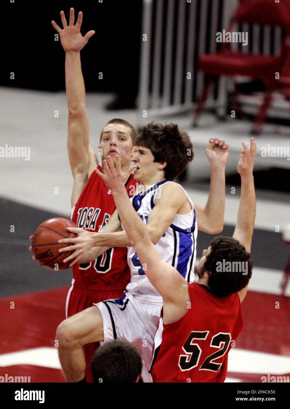 Brookfield Central's Cory Degner, center, cuts between Wauwatosa East's ...