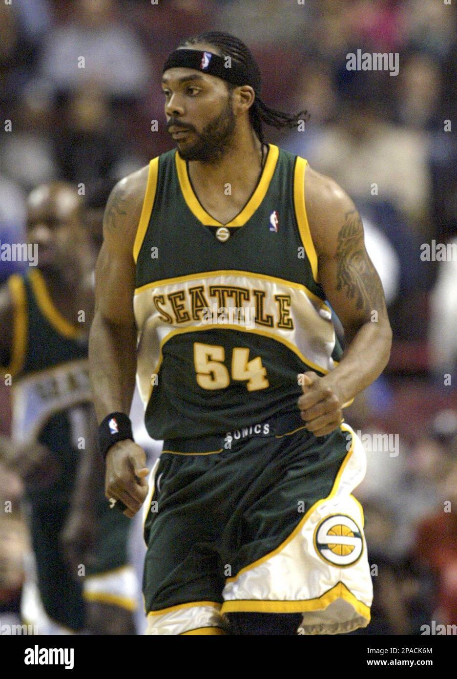 Seattle SuperSonics' Chris Wilcox runs up court after scoring against ...
