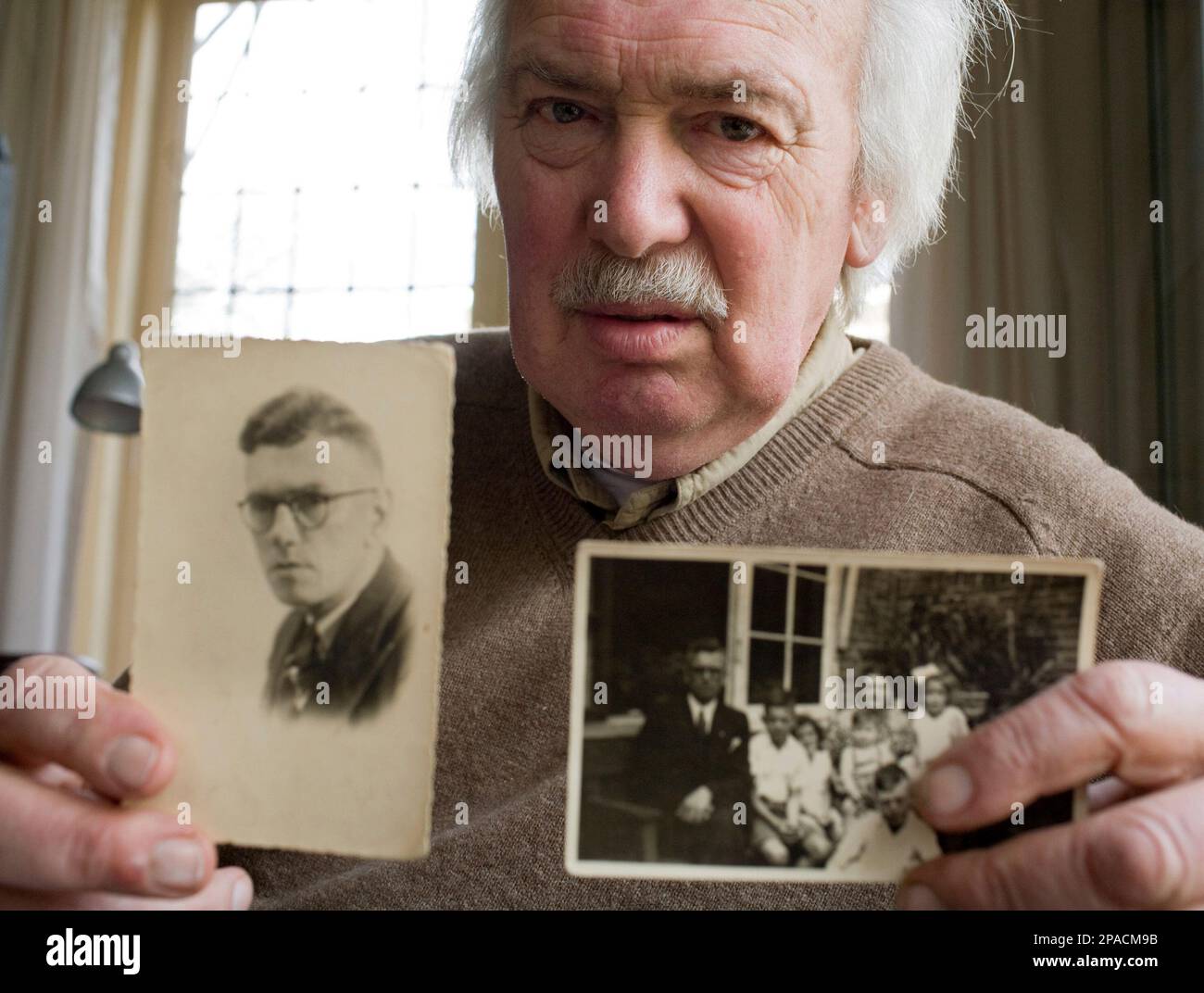 Teun de Groot shows an undated photo of his father, also called Teun de ...