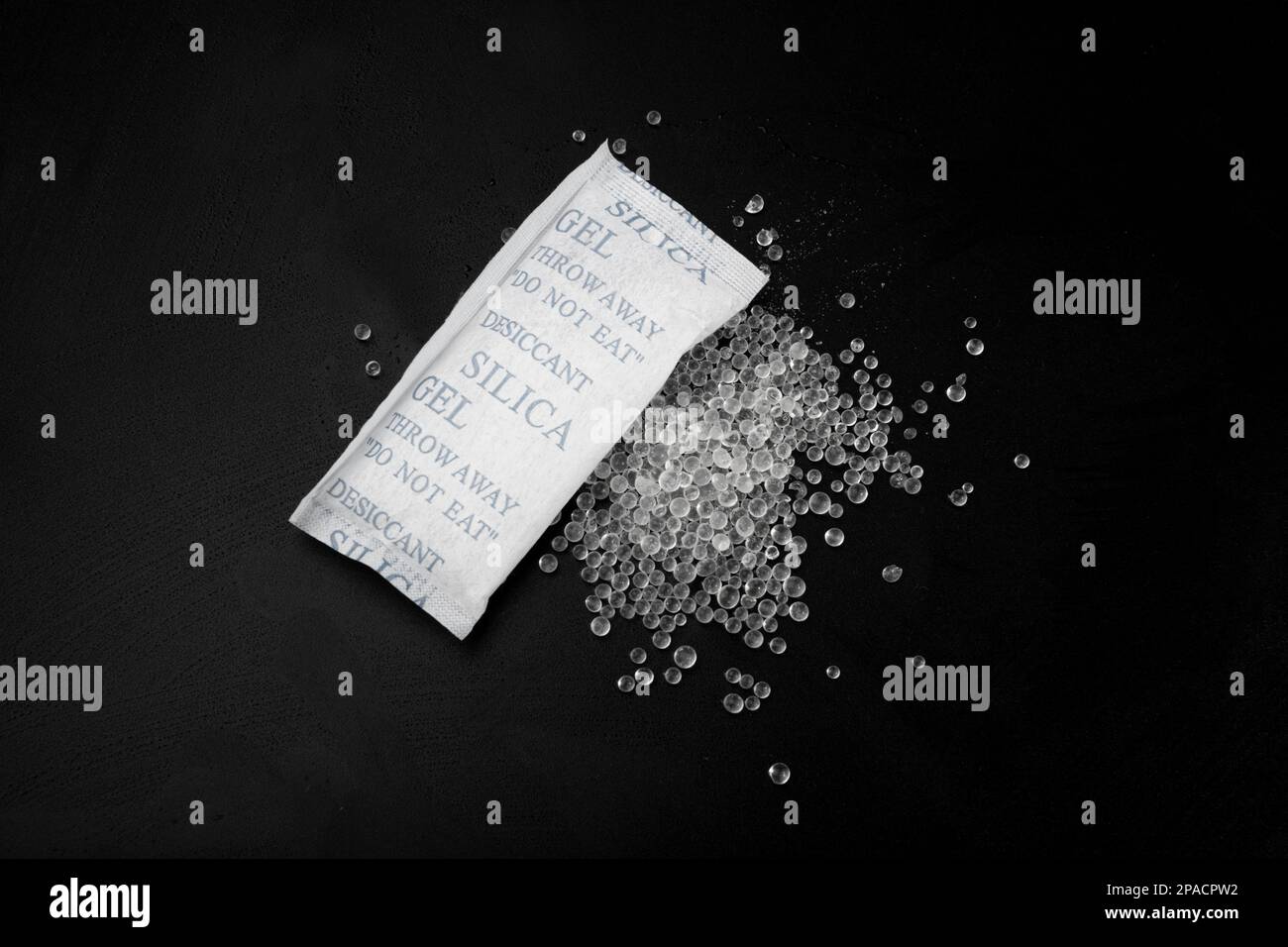 Desiccant Silica Gel Adsorbent Crystals on Black Background Top View ...