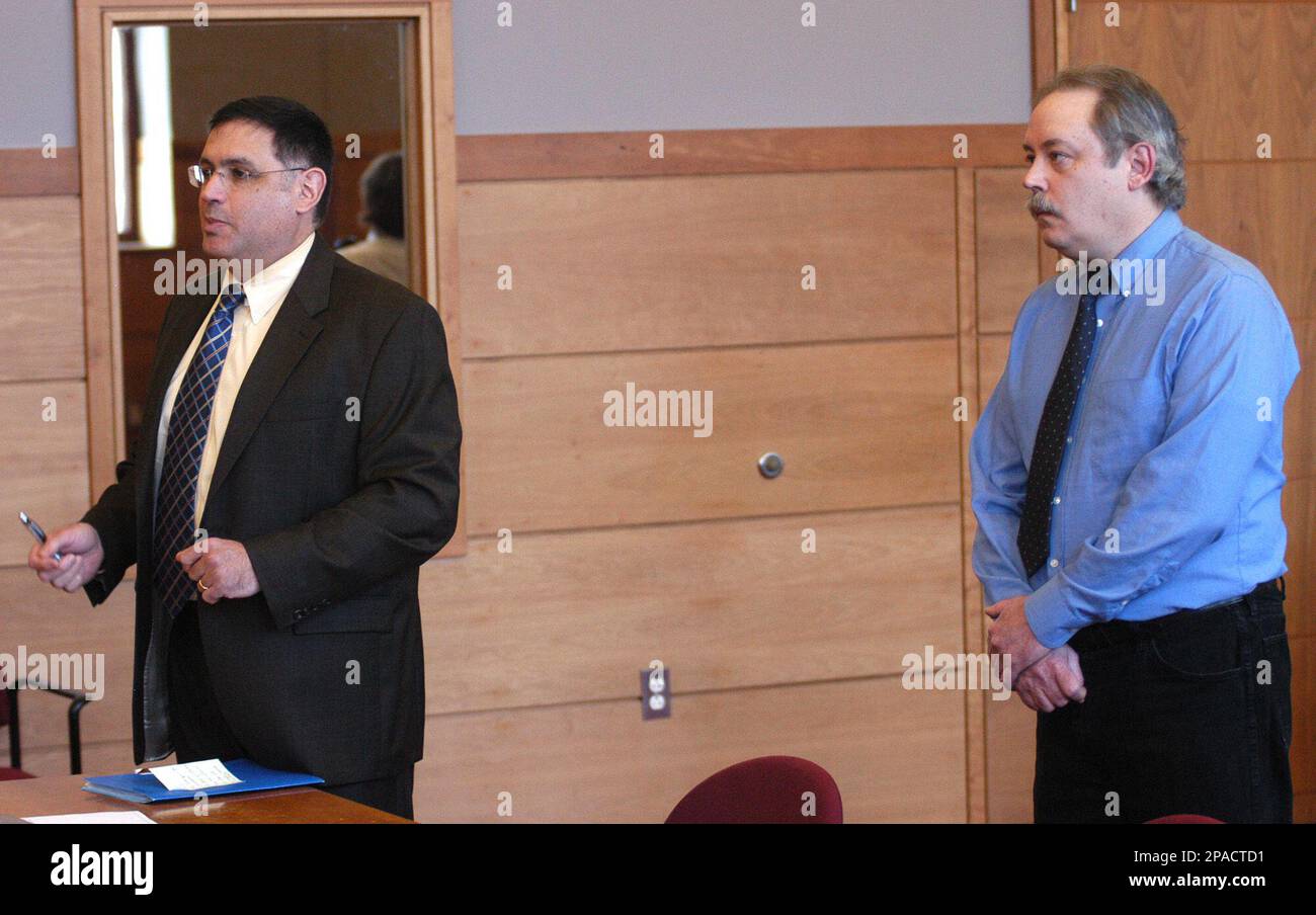 Attorney John Morris, left, appears with his client Daniel Winsky, a ...