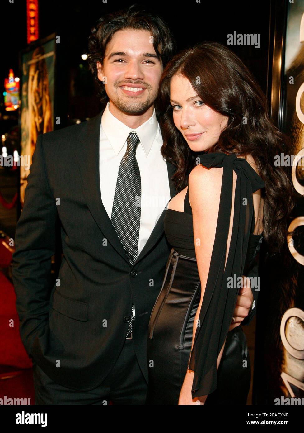 Cast member Steven Strait, left, and his wife, Lynn Collins, arrive at ...