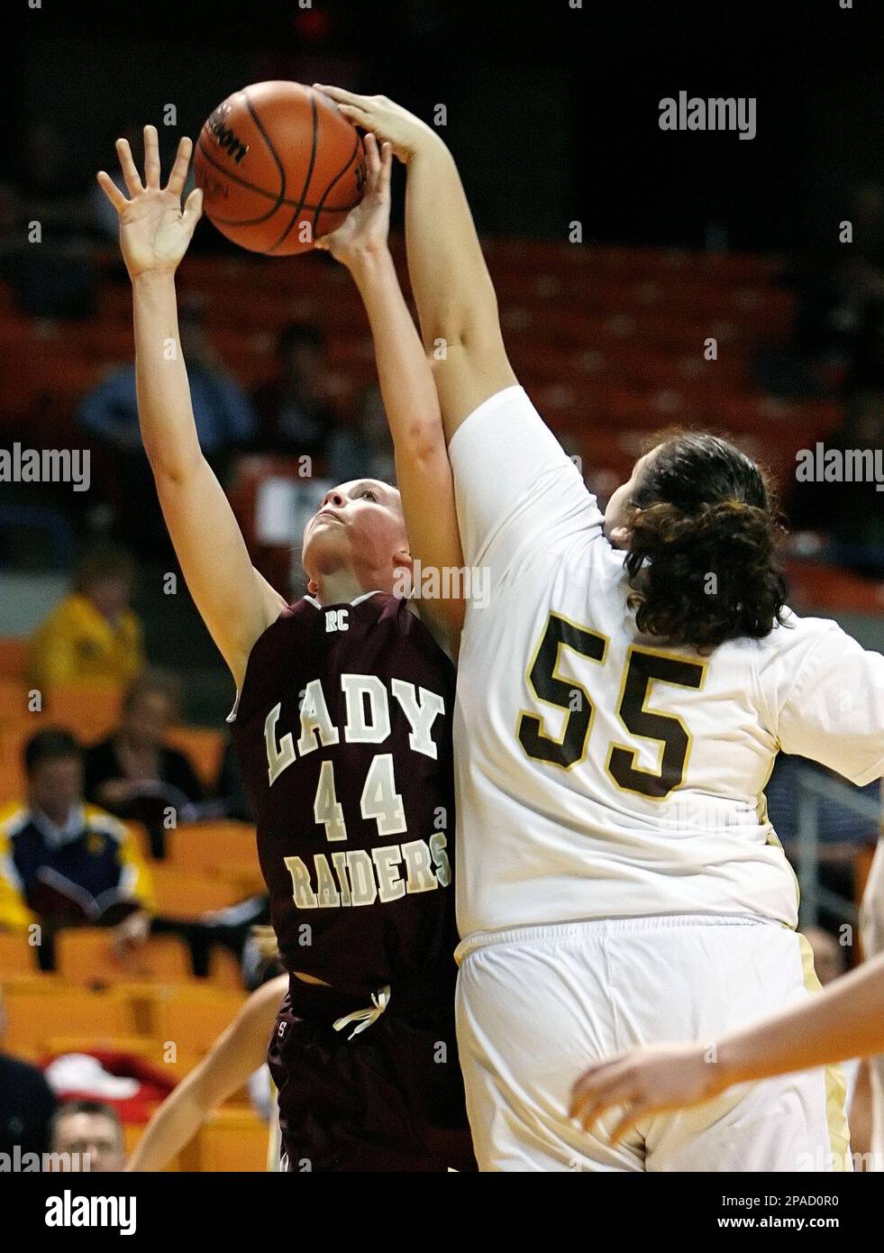 Lincoln's Rachel McIntire, right, blocks a shot by Roane County's ...