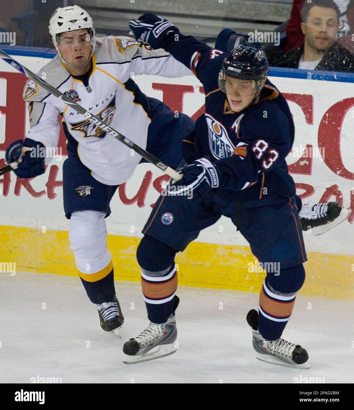 Nashville Predators' Dan Hamhuis, left, battles with Edmonton Oilers ...