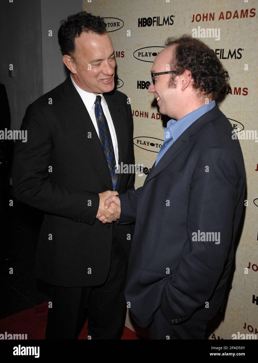 From right, actors Paul Giamatti and Tom Hanks arrive at the HBO ...