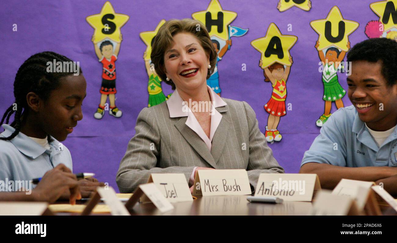 First lady Laura Bush shares a laugh with students at Henry C ...