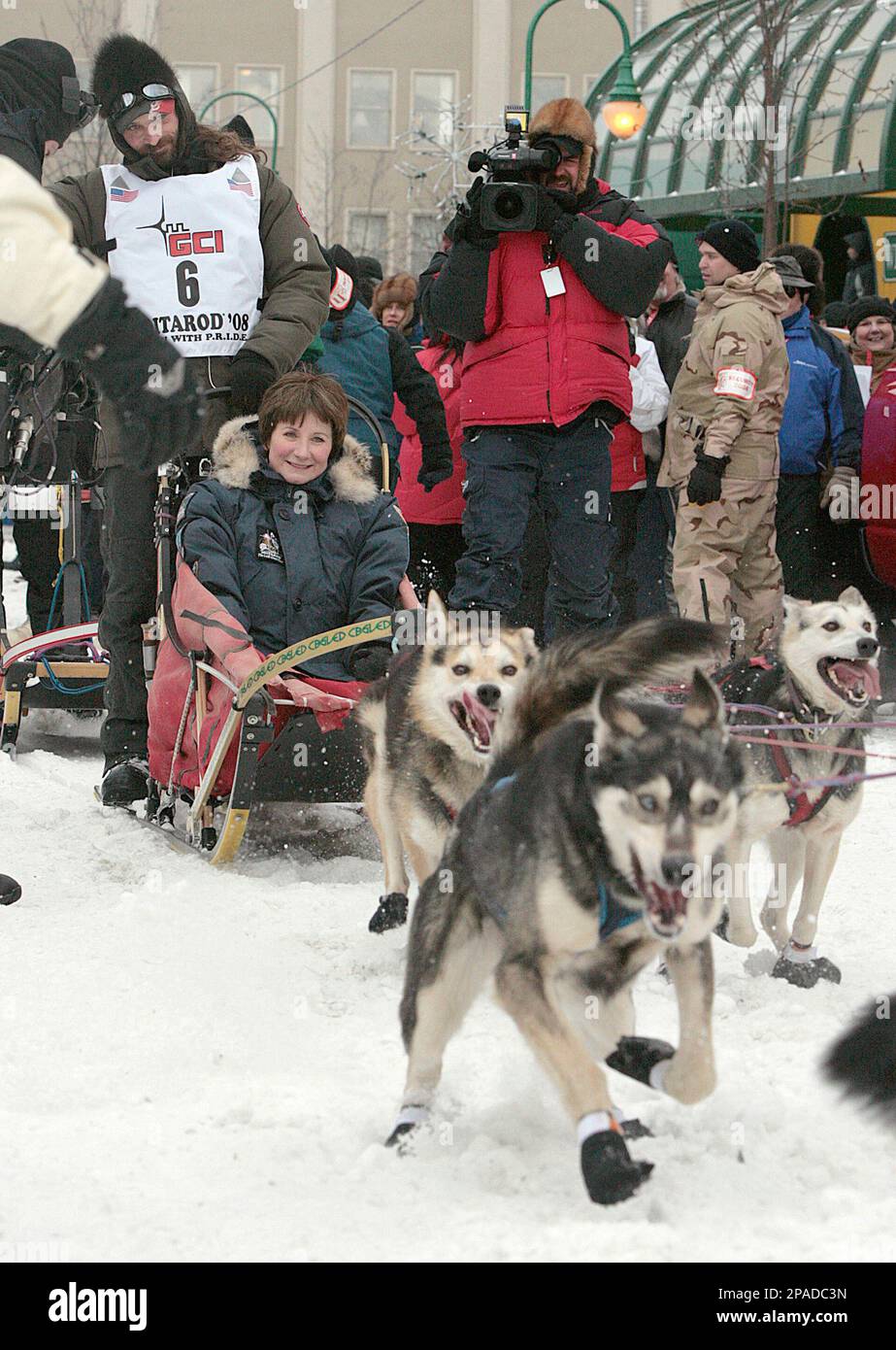Defending champion Lance Mackey of Fairbanks, Alaska, takes off, with ...