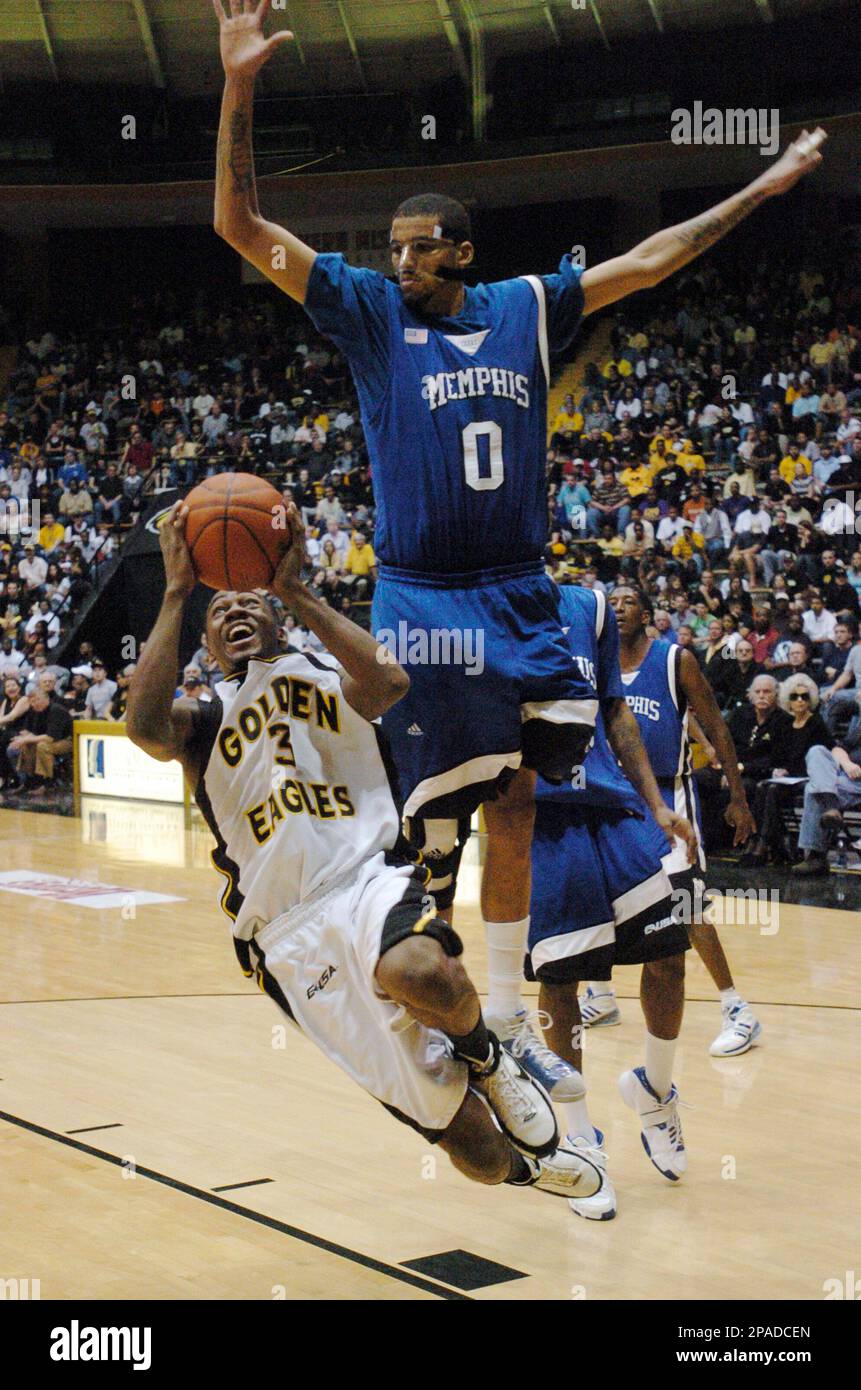 Southern Mississippi guard Jeremy Wise (3) goes airborne under Memphis ...
