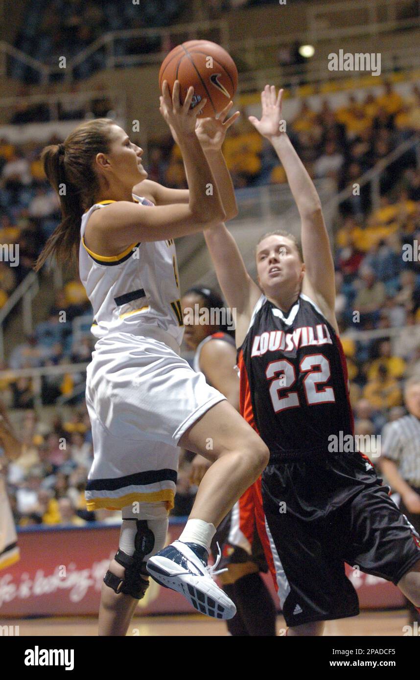 West Virginia's Meg Bulger shoots over Louisville's Brandie Radde ...