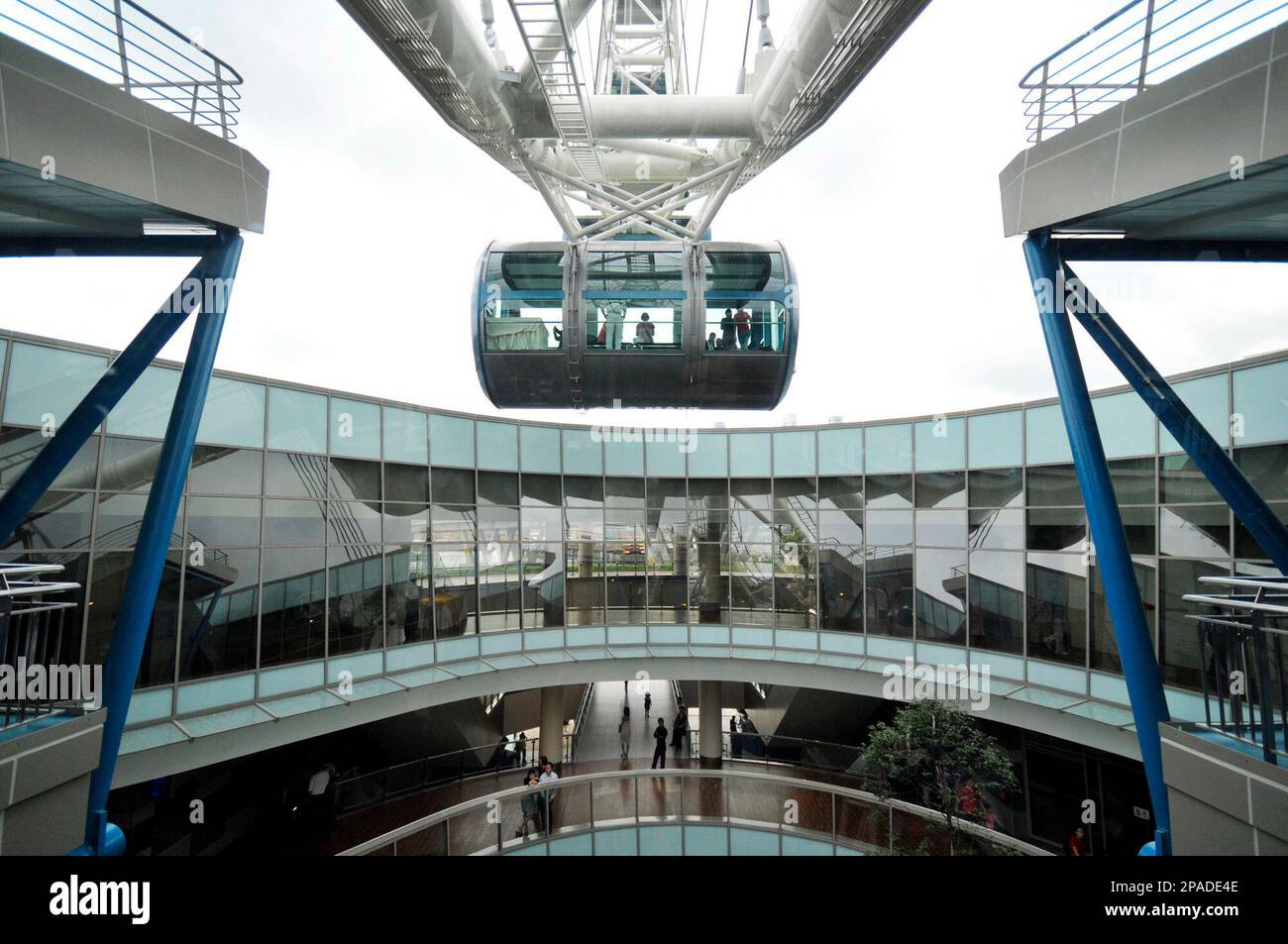 Passengers look out from one of the capsules on the world's biggest ...