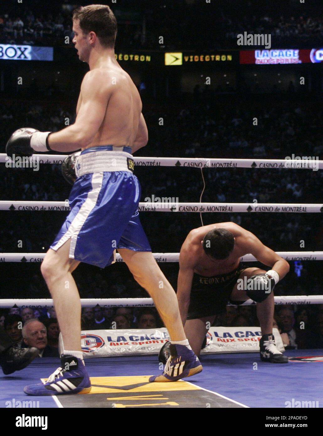 Boxer Jo Jo Dan of Montreal walks away after knocking out Leonardo Jose ...
