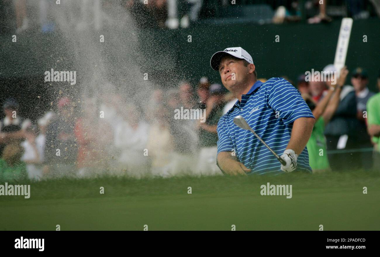 After hitting out of the rough, Dudley Hart hits out of a sand trap on ...