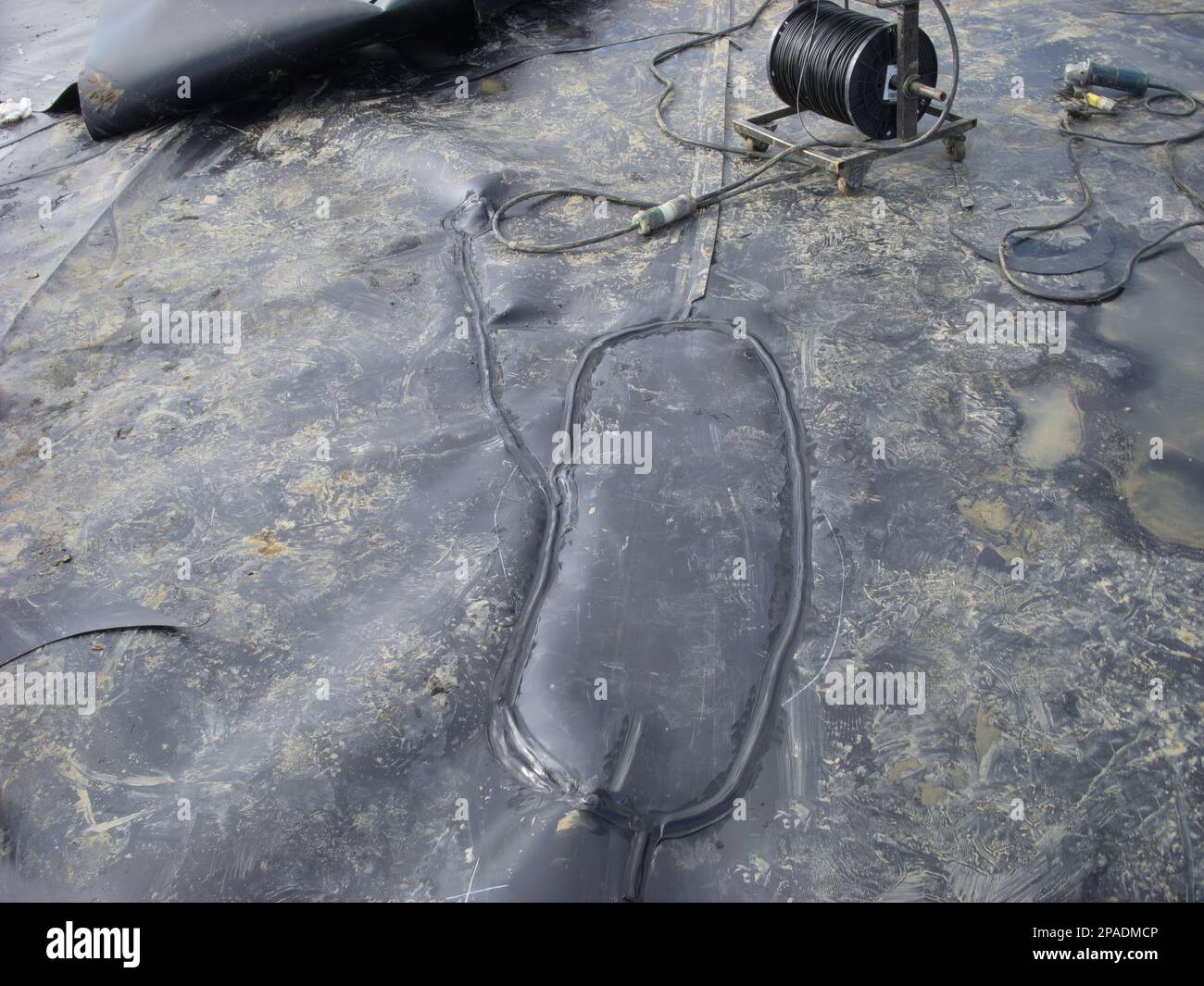 HDPE landfill liner patch installed on a bad weld seam Stock Photo - Alamy