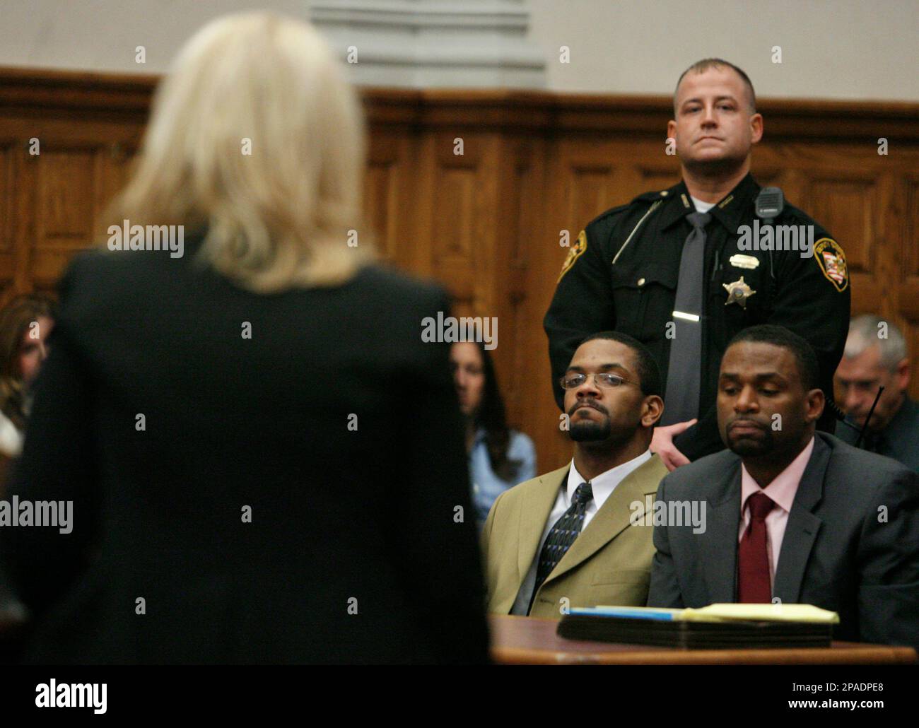 Bobby Cutts Jr., seated on left, listens as Patricia Porter, Jessie ...