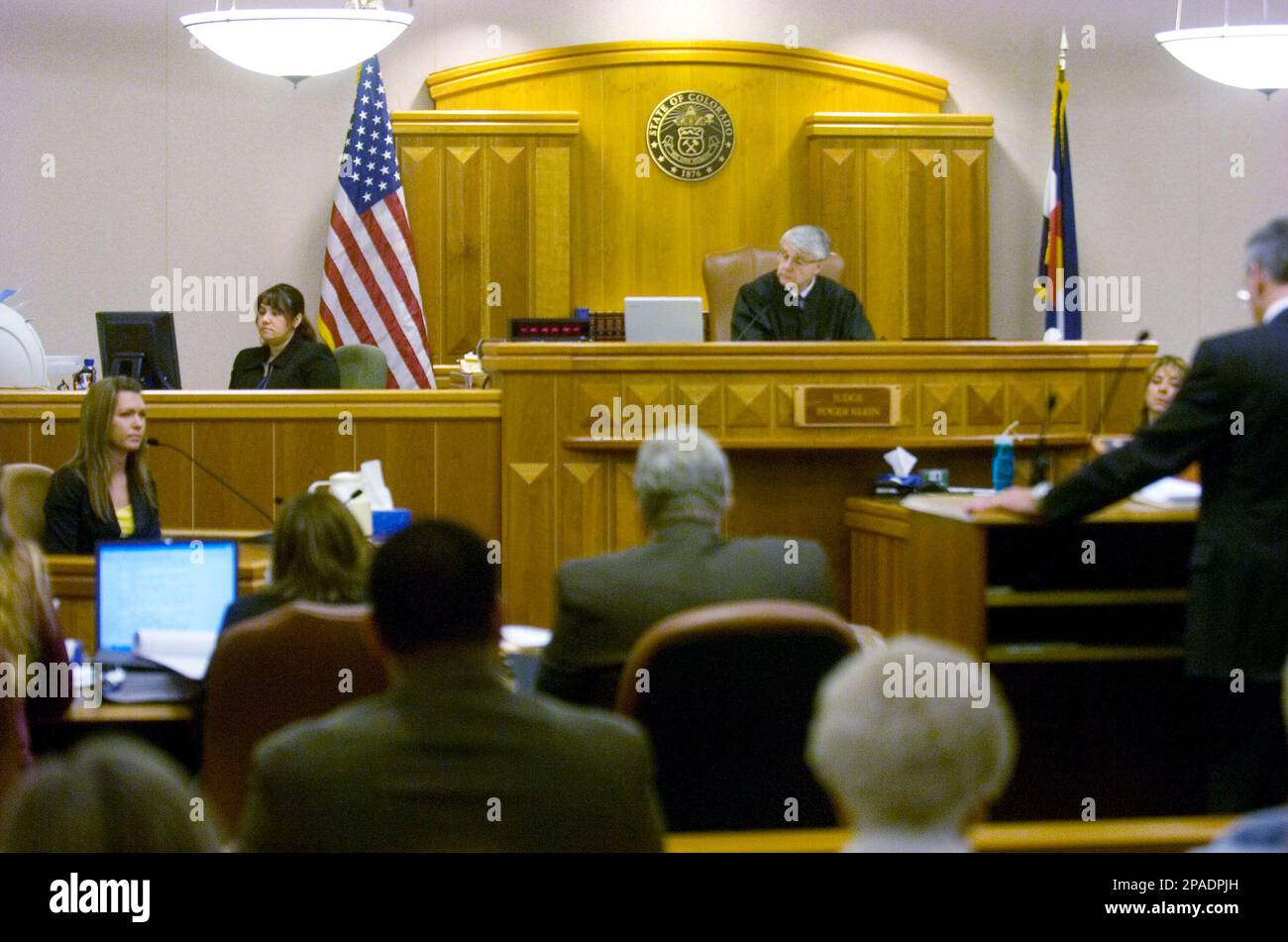 Michelle Moore, in the witness stand at left, and a confidant of Shawna ...