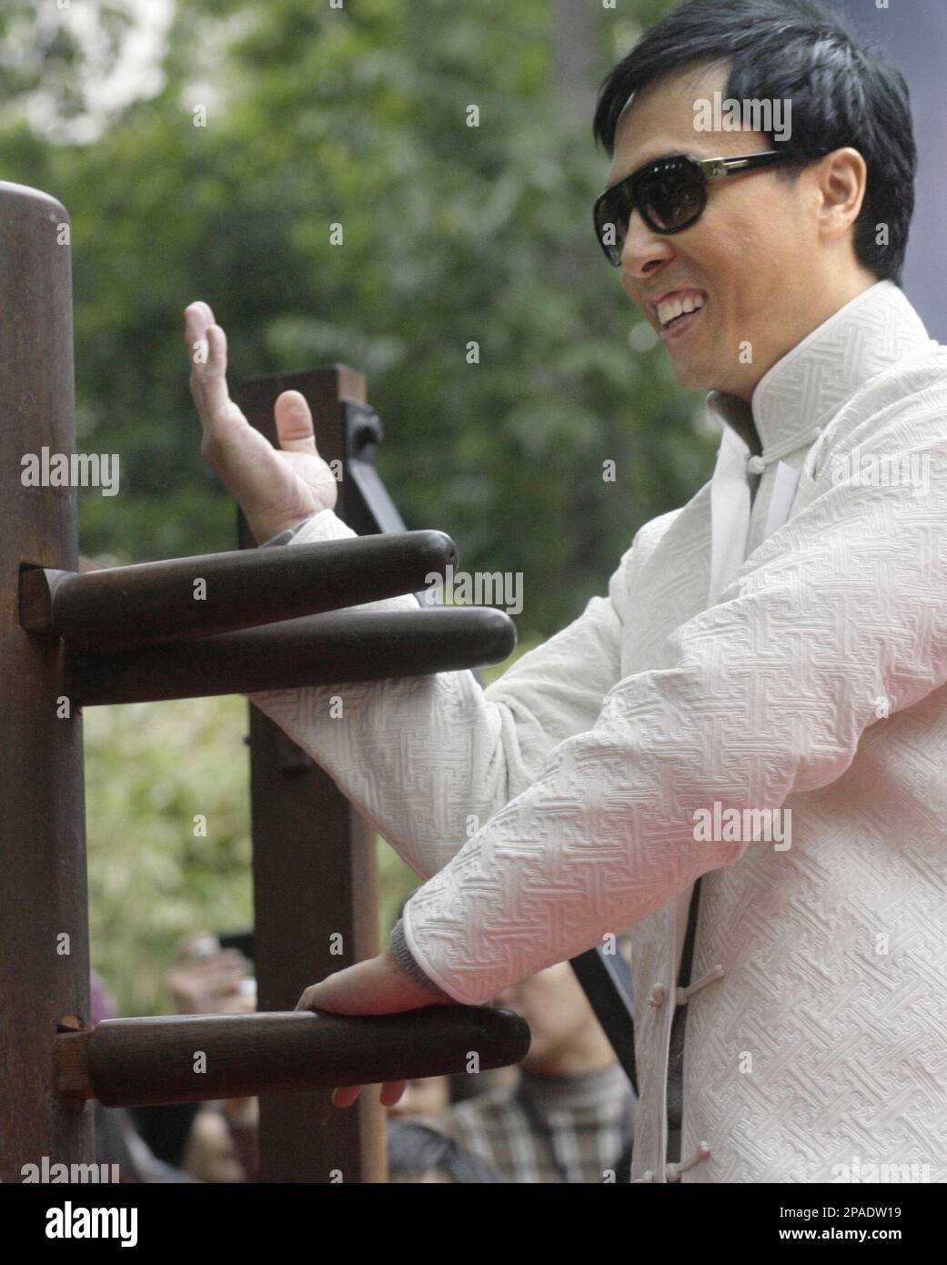 Hong Kong action star Donnie Yen poses for photographers during a press ...