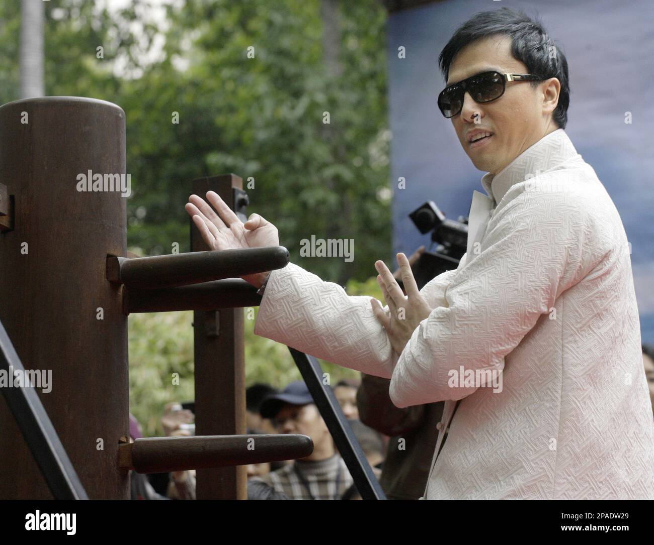 Hong Kong action star Donnie Yen poses for photographers during a press ...