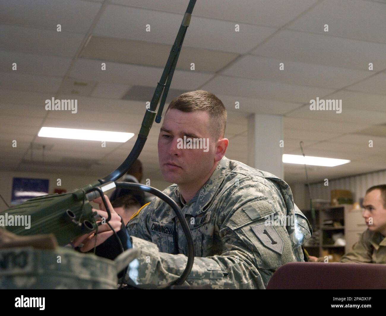 Army Sgt. 1st Class David Cunningham participates in a communications ...