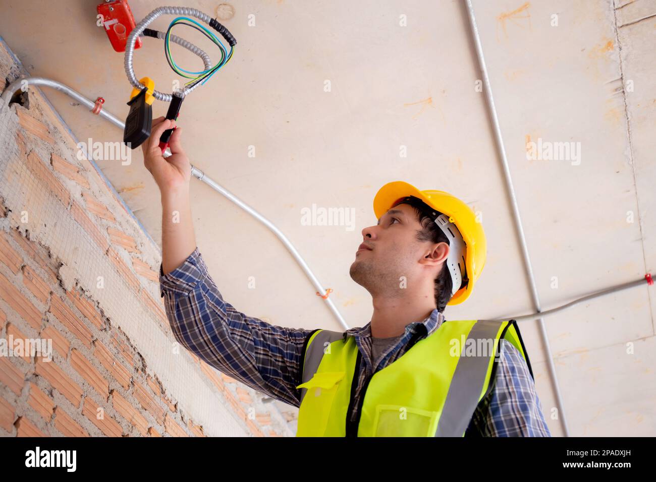 Young engineer caucasian man repair electricity at house, electrician ...