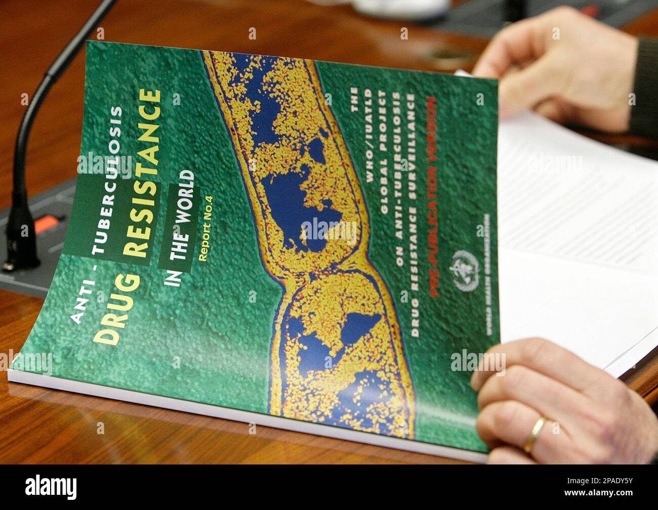 A journalist reads the report "Anti-Tuberculosis Drug Resistance in the ...