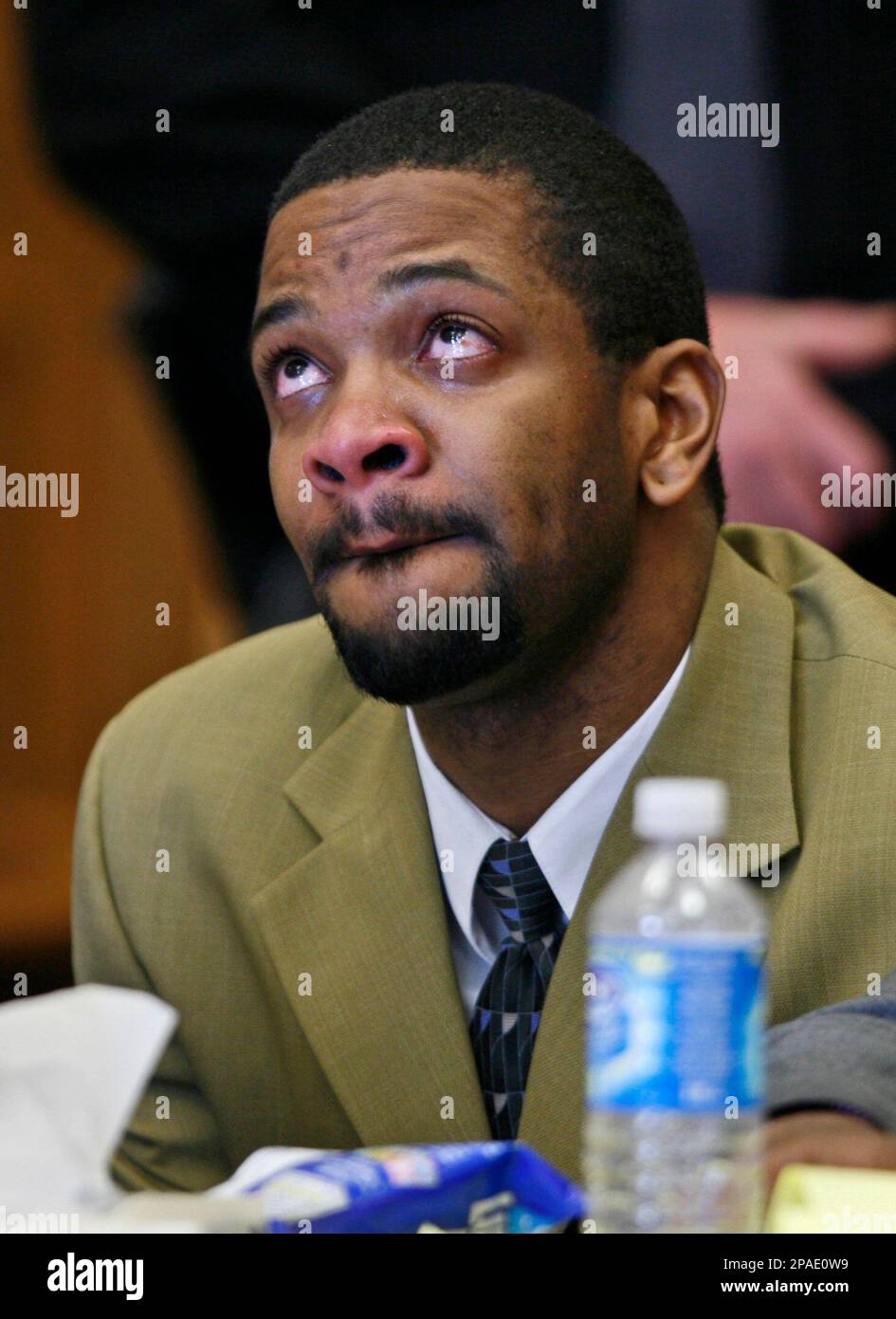 Bobby Cutts Jr., sits at the defense table after reading an apology at ...