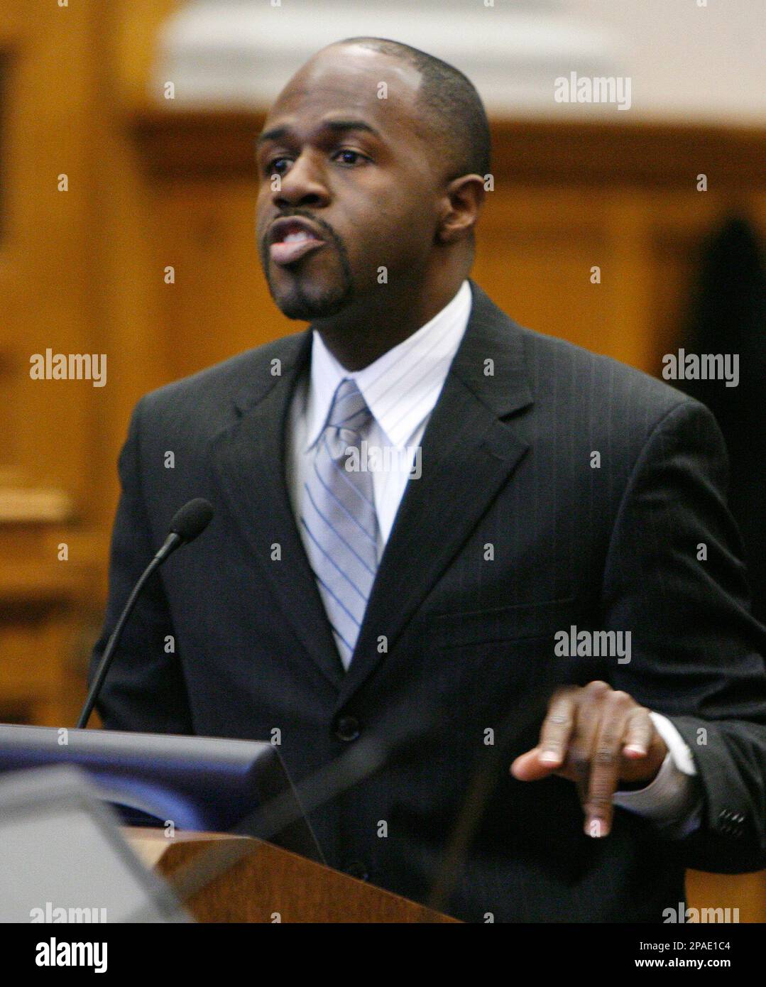Defense attorney Myron Watson makes his opening statement in the ...