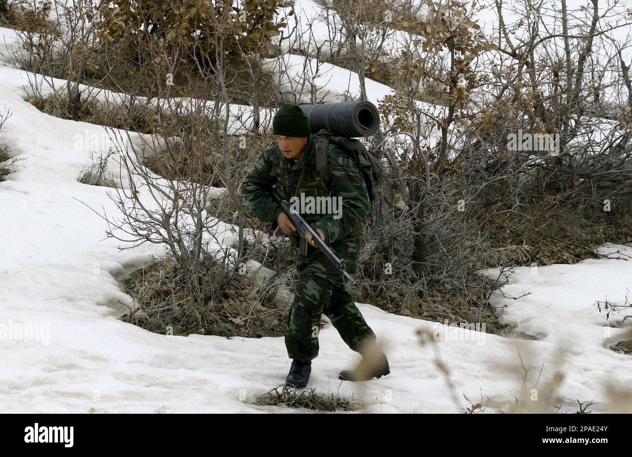 A Turkish commando patrols near the town of Senoba in Sirnak province ...