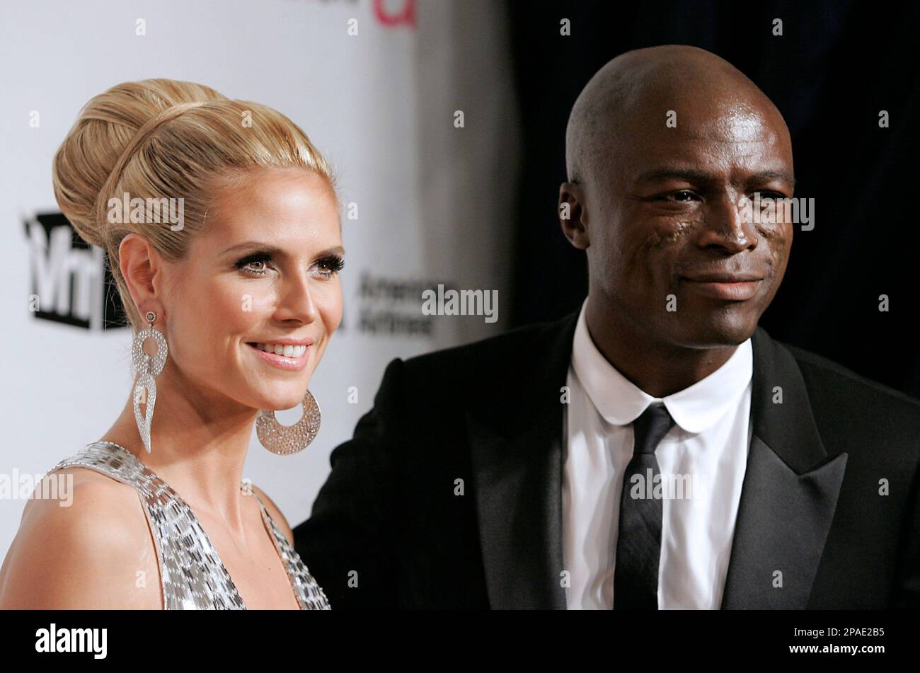 Model Heidi Klum, left, and her husband, singer, Seal pose on the press ...