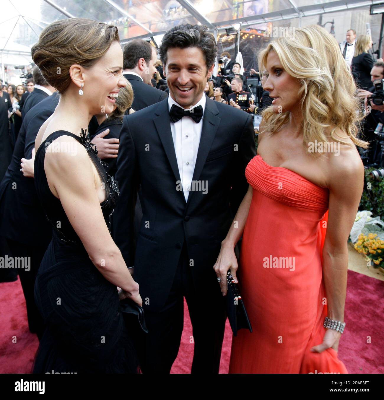 Hilary Swank, left, Patrick Dempsey, center, and his wife, Jill Fink ...