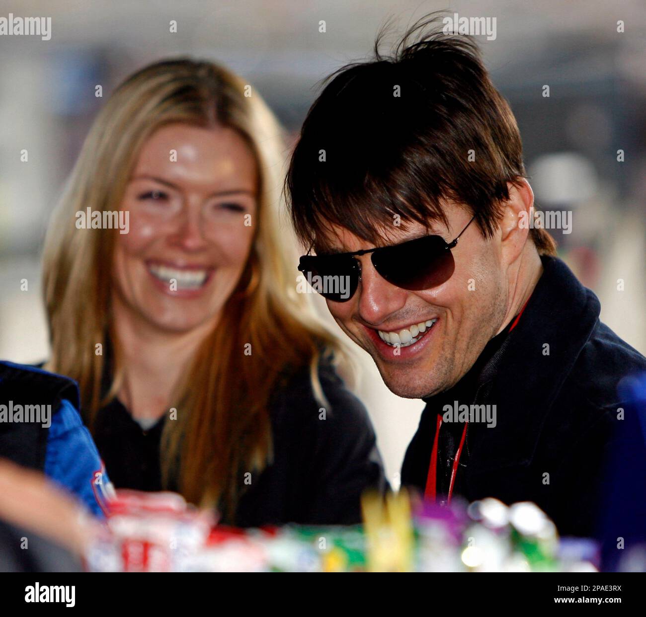 Actor Tom Cruise, right, visits with Chandra Johnson, wife of NASCAR ...