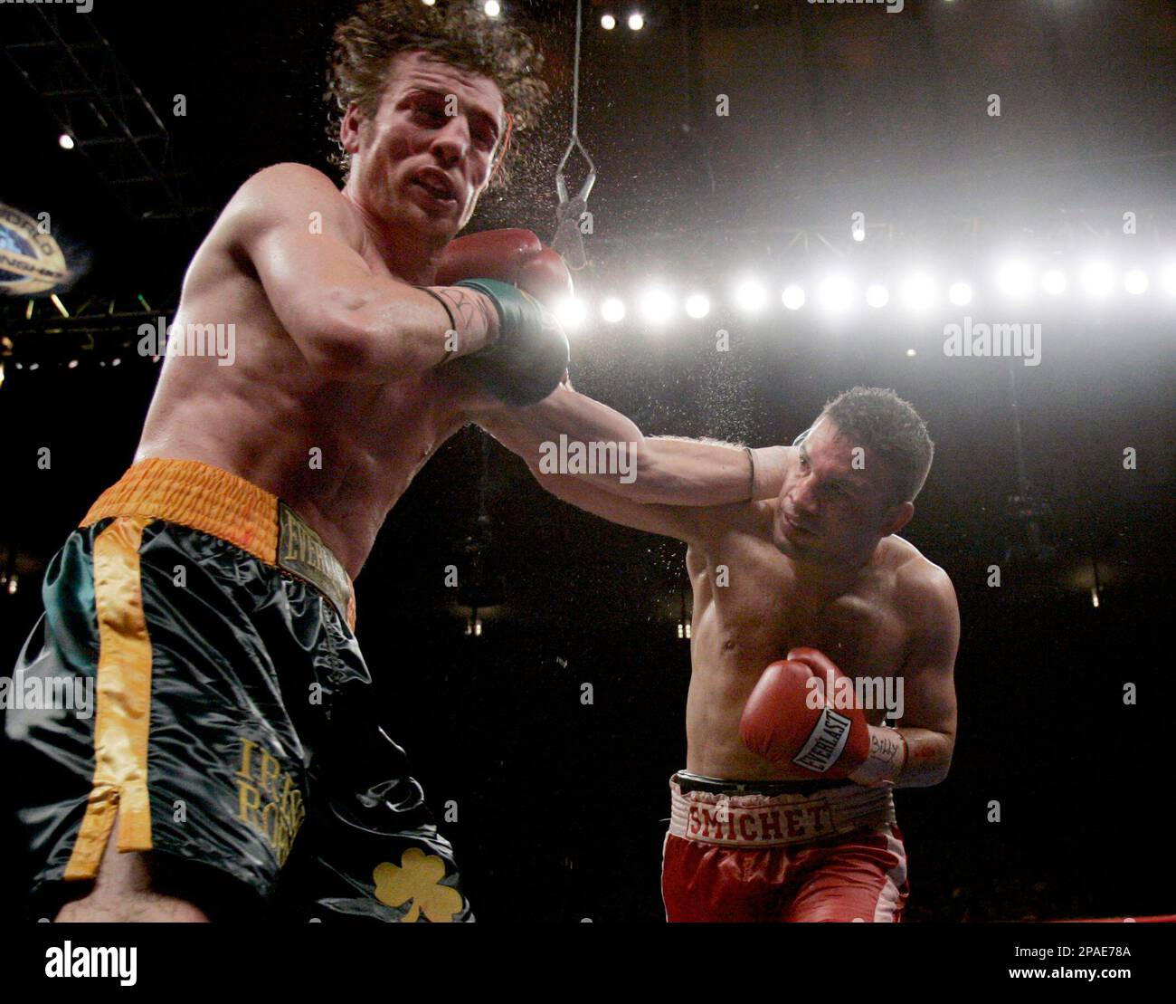 Walid Smichet, right, punches John Duddy, of Northern Ireland, during ...
