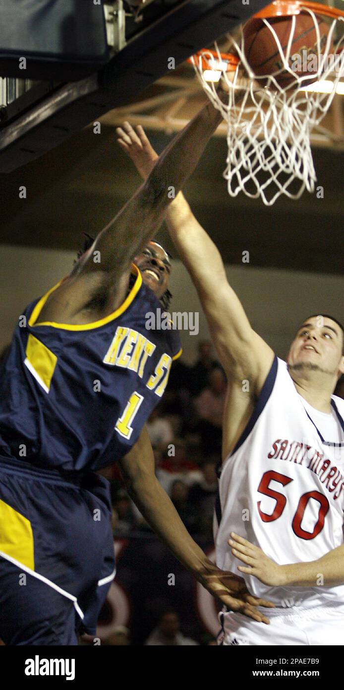 Kent State's Haminn Quaintance (1) dunks over St. Mary's Omar Samhan ...