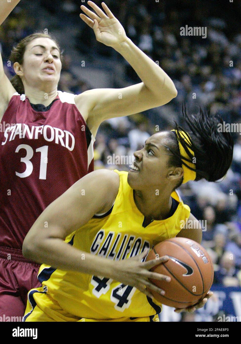 California's Ashley Walker (44) looks to shoot past Stanford's Morgan ...