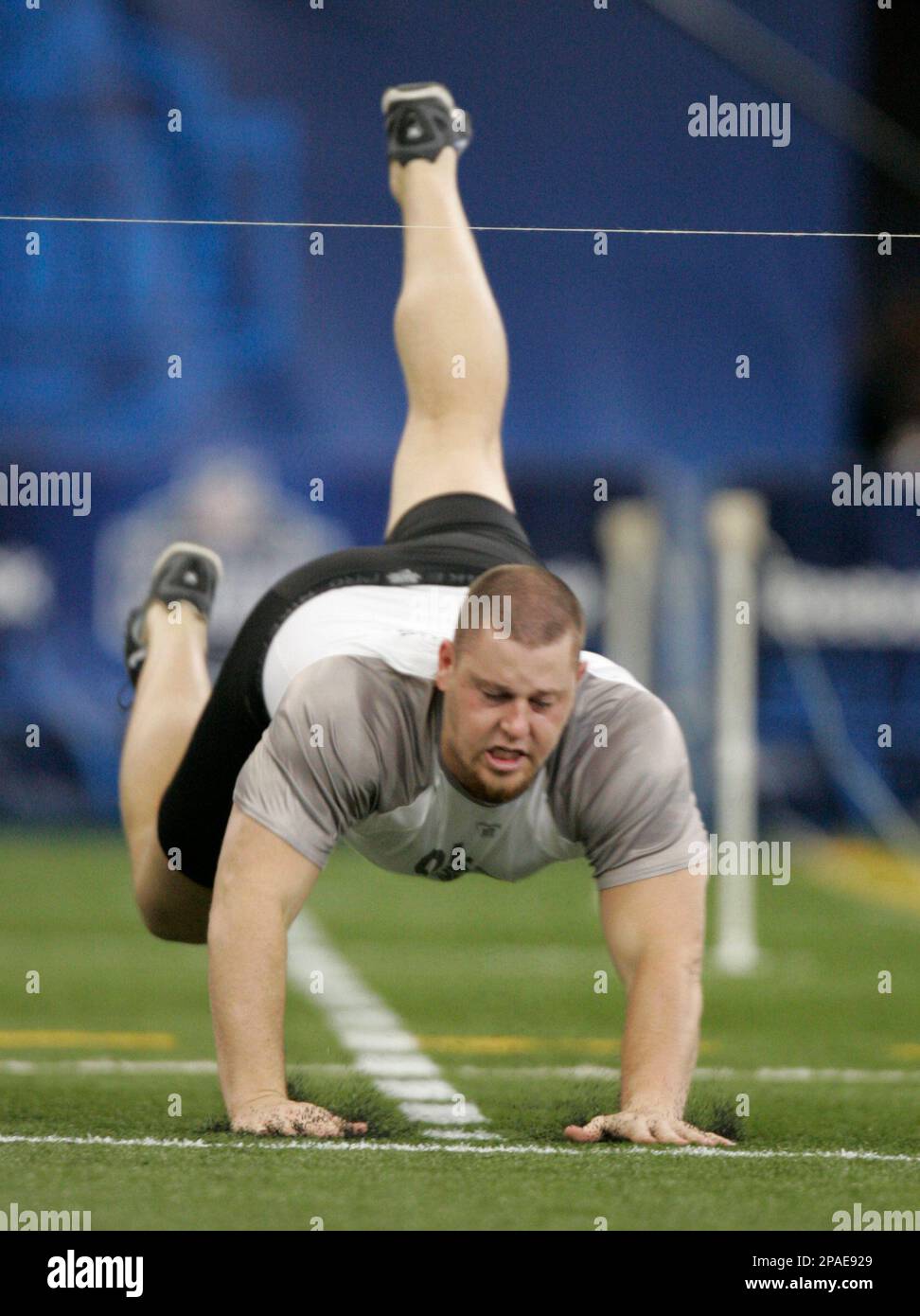 Offensive lineman Tyler Polumbus of Colorado falls as he finishes the ...