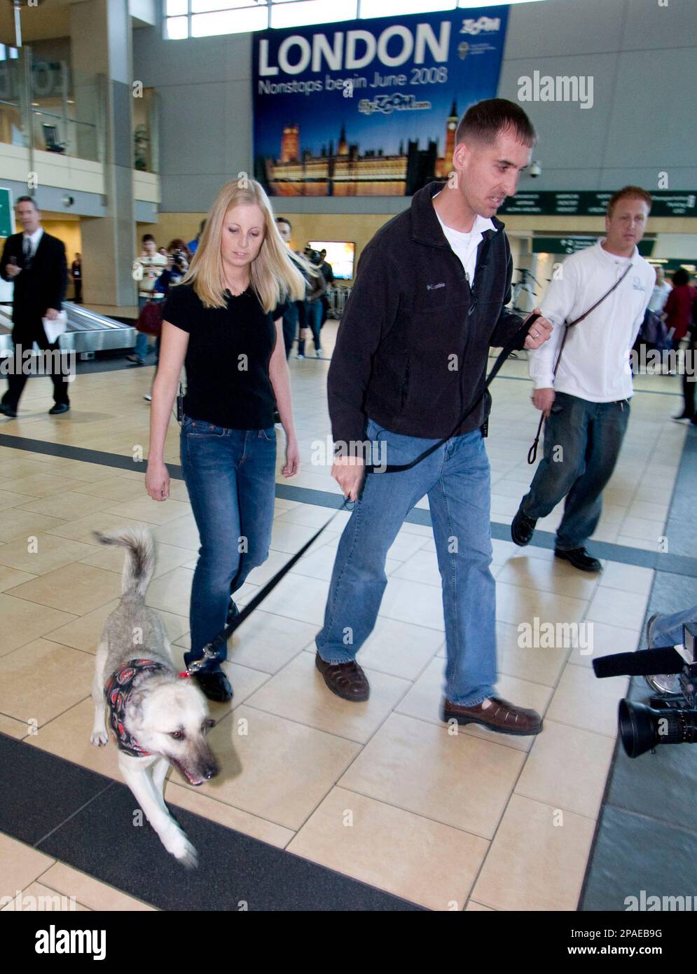 Marine Corps Capt. Eric Sjoberg, right, and his wife Chrissy Sjoberg ...